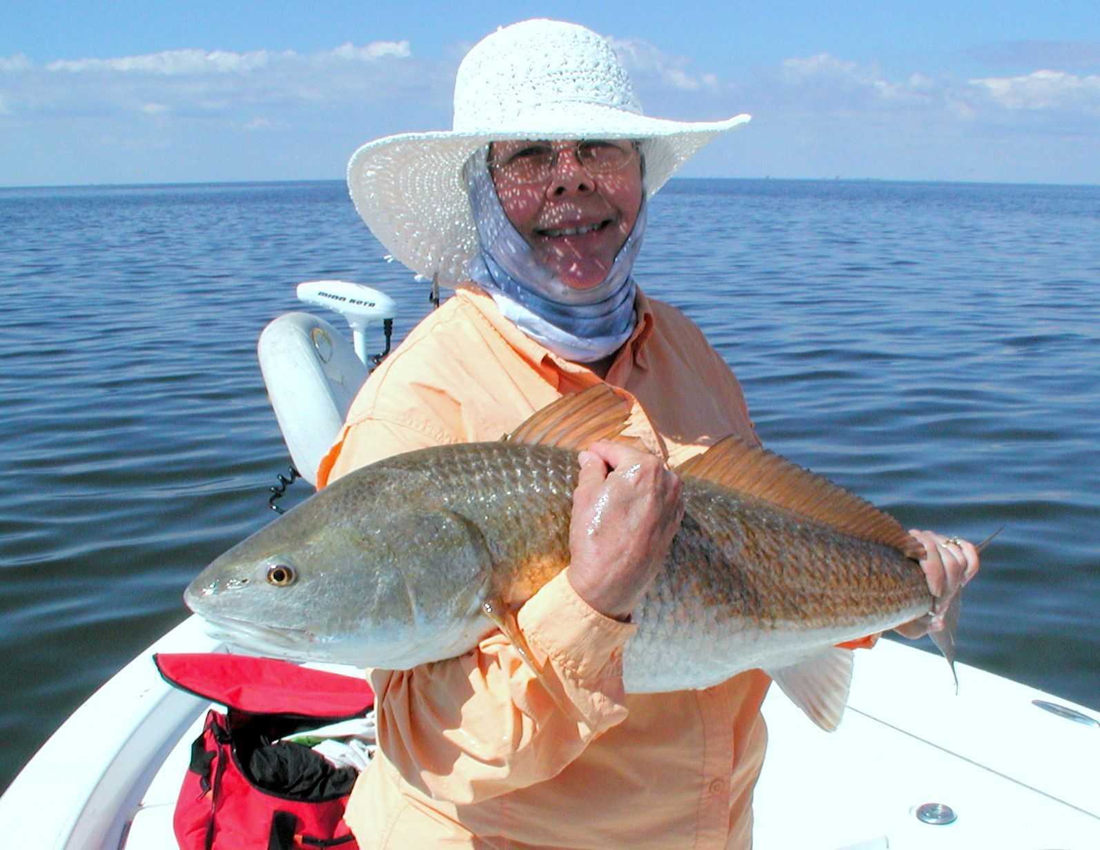 Have You Hugged Your Redfish Today? | Coastal Angler & The Angler Magazine