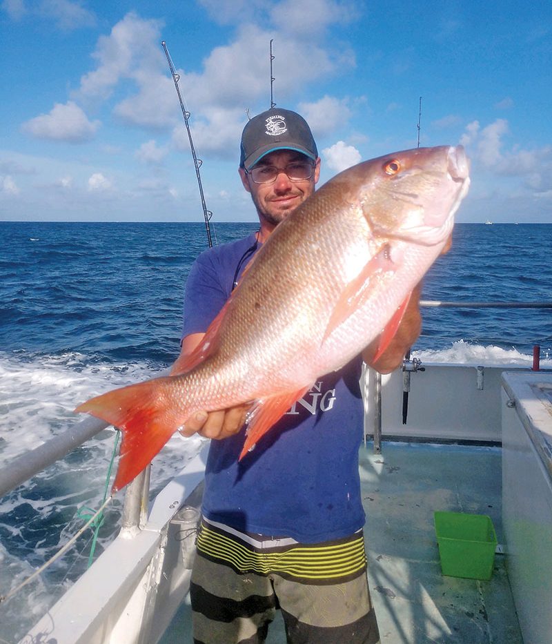 Ryan with a nice mutton snapper caught aboard the Catch My Drift ...
