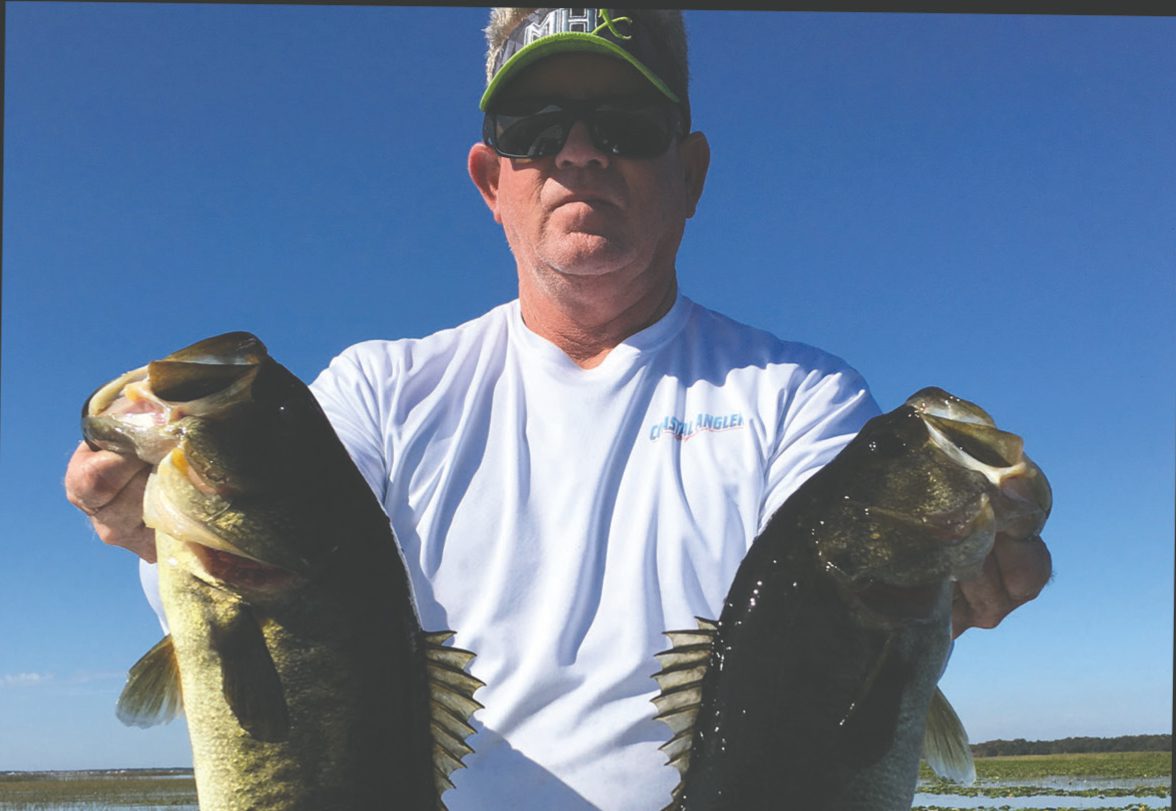 Orlando CAM owner Phil Wolf with a pair of Lk. Toho bass | Coastal ...
