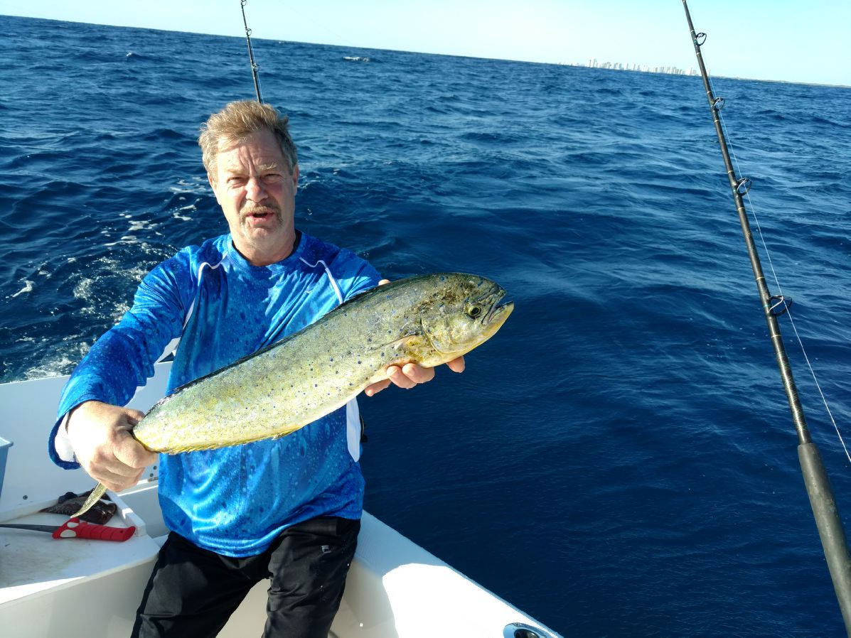 Richard McIntosh from Delaware with a dolphin off MacArthur - Coastal ...