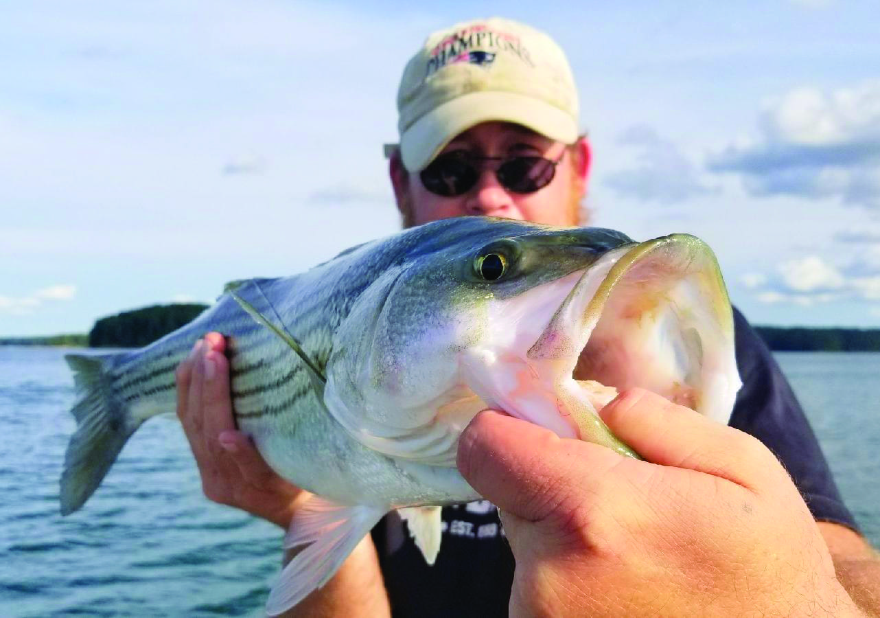Benn Irwin with his Lake Lanier striper - Coastal Angler & The Angler ...