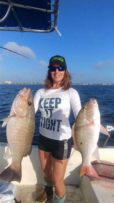 Dawn Williams with a mangrove and mutton snapper caught off Palm Beach ...