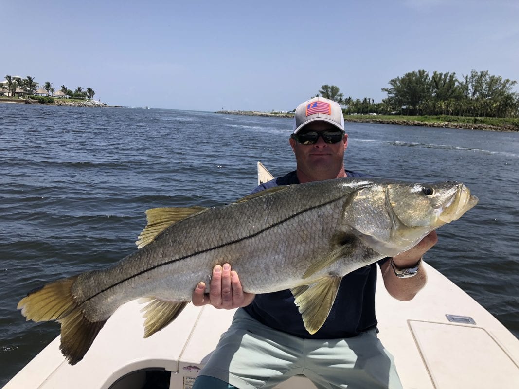Hunter Sharpe of Palm Beach with a 44 inch snook he caught with Capt ...