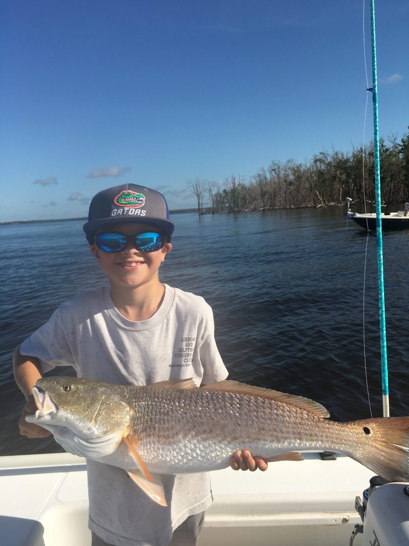 Kale Small with a 30 inch Redfish,his first red,in Chokoluskee. Even ...