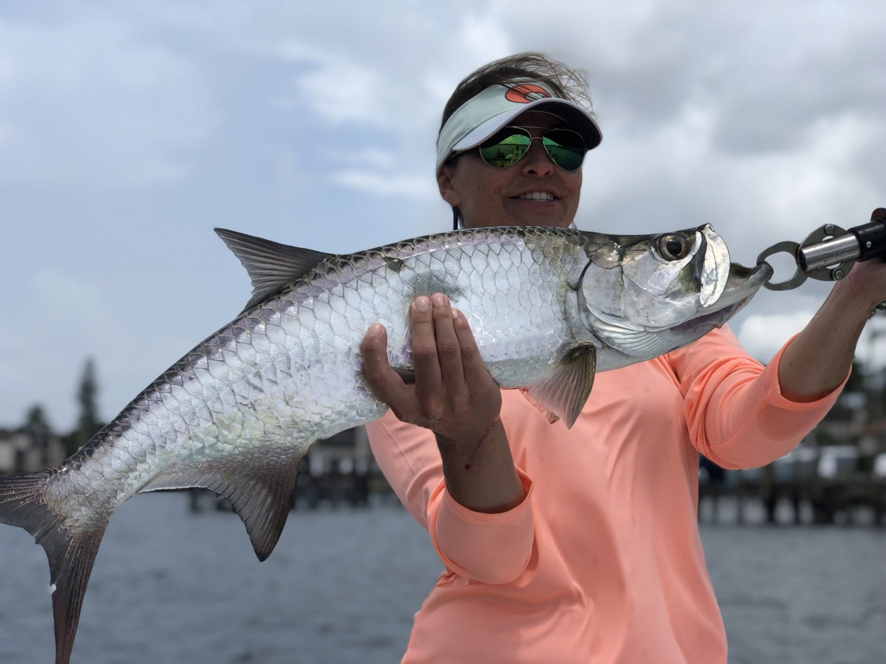 Kim with her 1st tarpon – Photo courtesy of PhlatsInshoreFishing ...