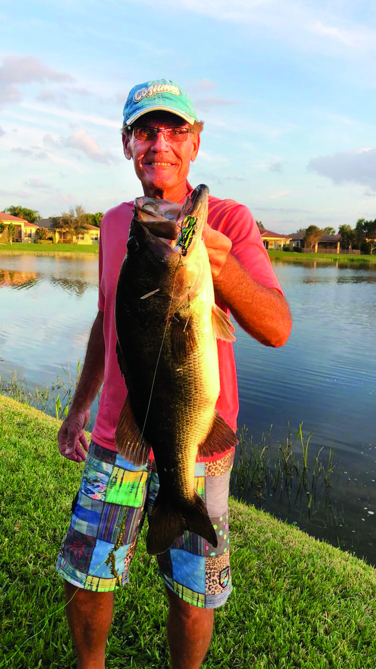 Bob Carbone caught this lunker bass in the community lakes at Four ...