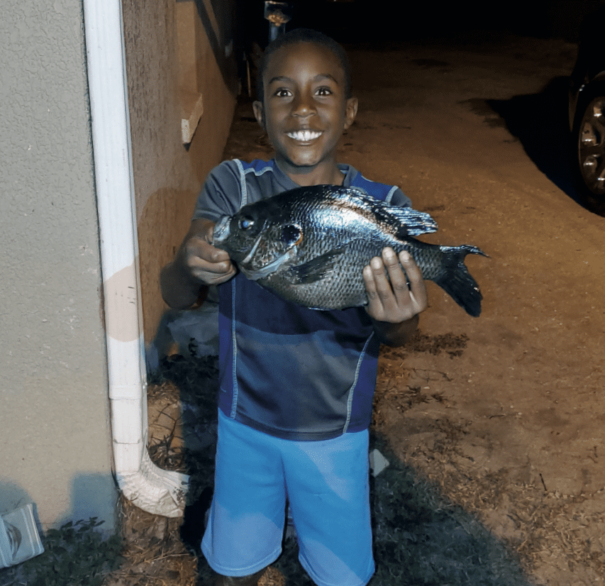 7 yr. old Gabriel Boston with a HUGE Bluegill, Dinner Time! - Coastal ...