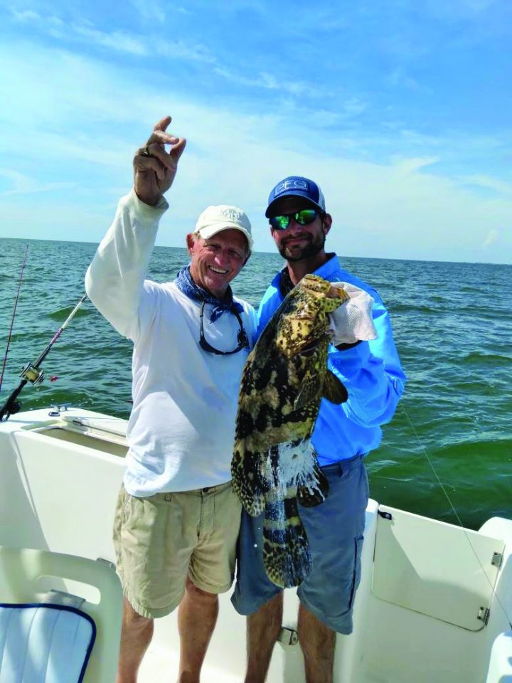 Capt. Sam Bressler & 1st mate Zack Bright w/ a Goliath grouper, out of ...