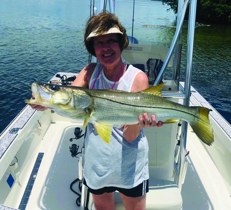 Jane proudly showing off this beauty (snook). - Coastal Angler & The ...