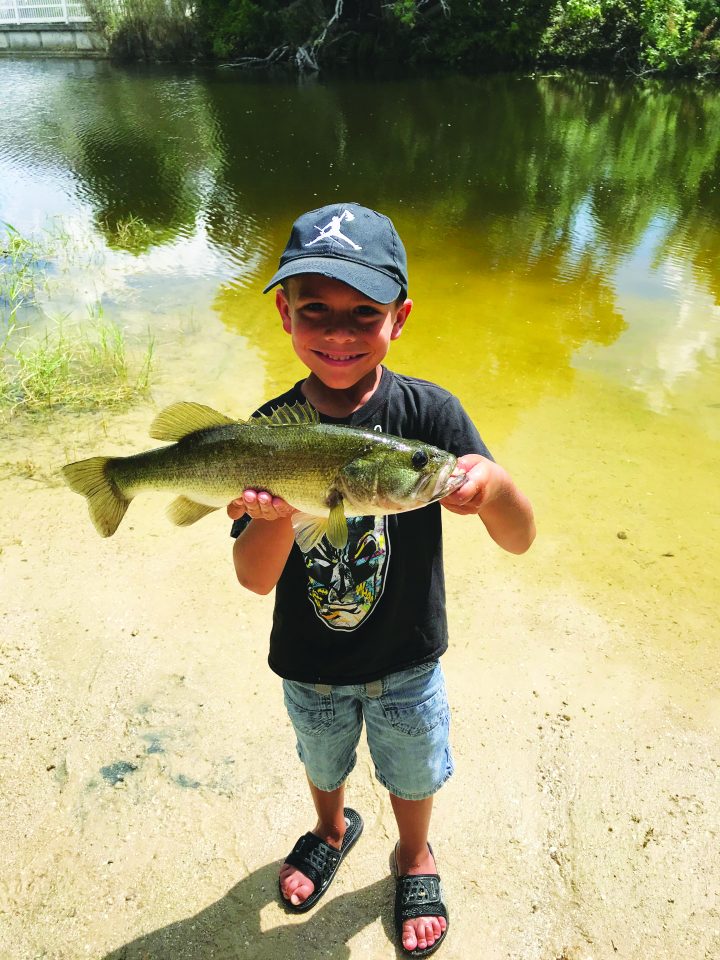 George Ramirez with a nice bass! - Coastal Angler & The Angler Magazine