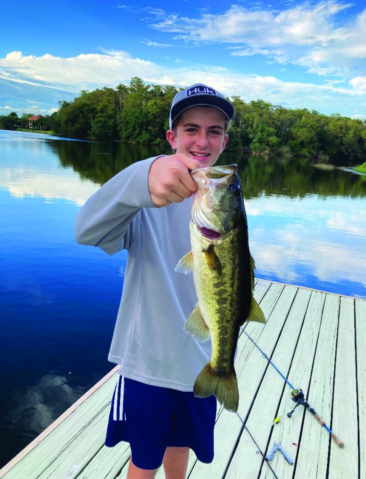 Jacob with a nice largemouth bass. - Coastal Angler & The Angler Magazine
