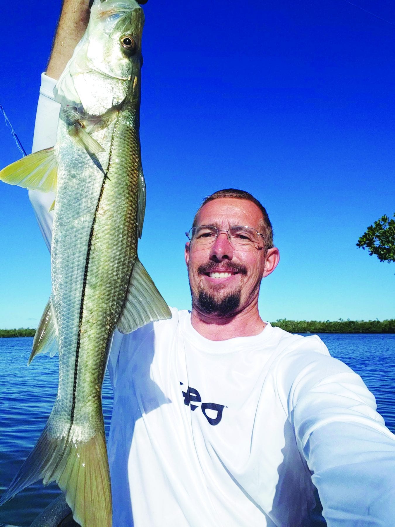 Larry Wall sharing some snook action from a kayak! - Coastal Angler ...