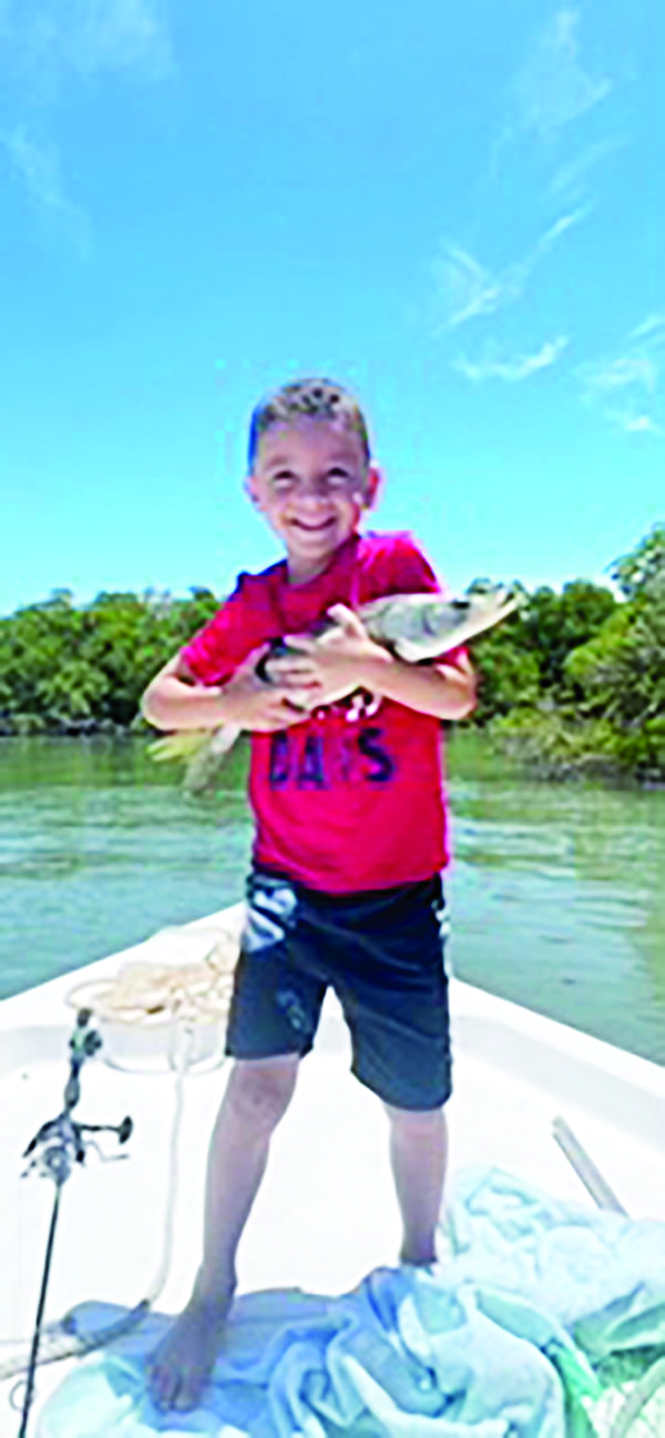 Anthony with an awesome snook. - Coastal Angler & The Angler Magazine