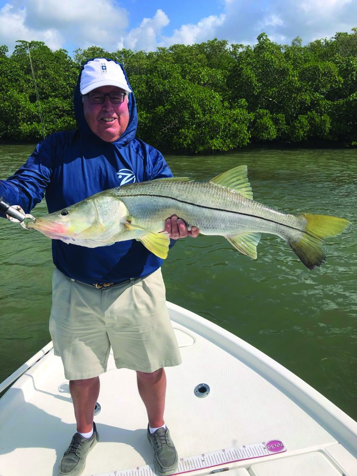 John Yetter w/ a beautiful 36.5” snook from the mouth of Haldemann ...