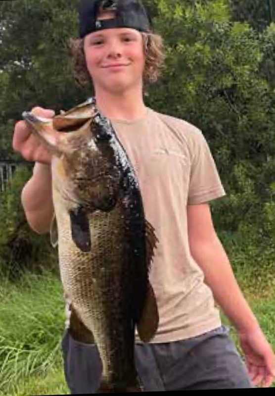 Hayden Wolf with “Biggin” he caught in a private pond in Chuluota - Coastal Angler & The Angler ...