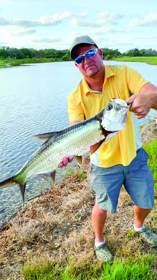 Justin Guess with a Tarpon caught in Estero - Coastal Angler & The ...