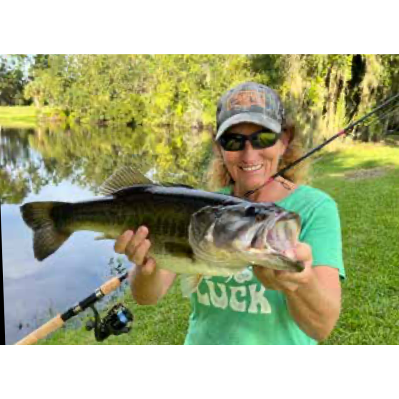 Deanna Jenkins with a “Biggin” she caught in a private pond with her ...