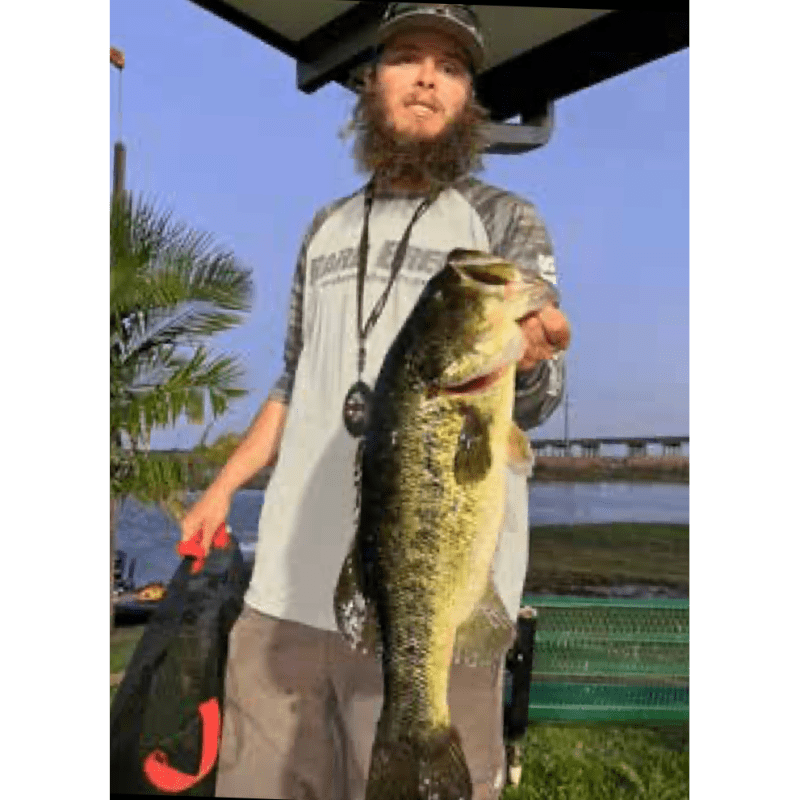 Bubba Myers with “Big Bass” of the 1st Jolly Gator Bass Series event in ...