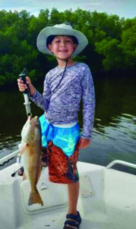 Mason Sosa is showing off his redfish. - Coastal Angler & The Angler ...
