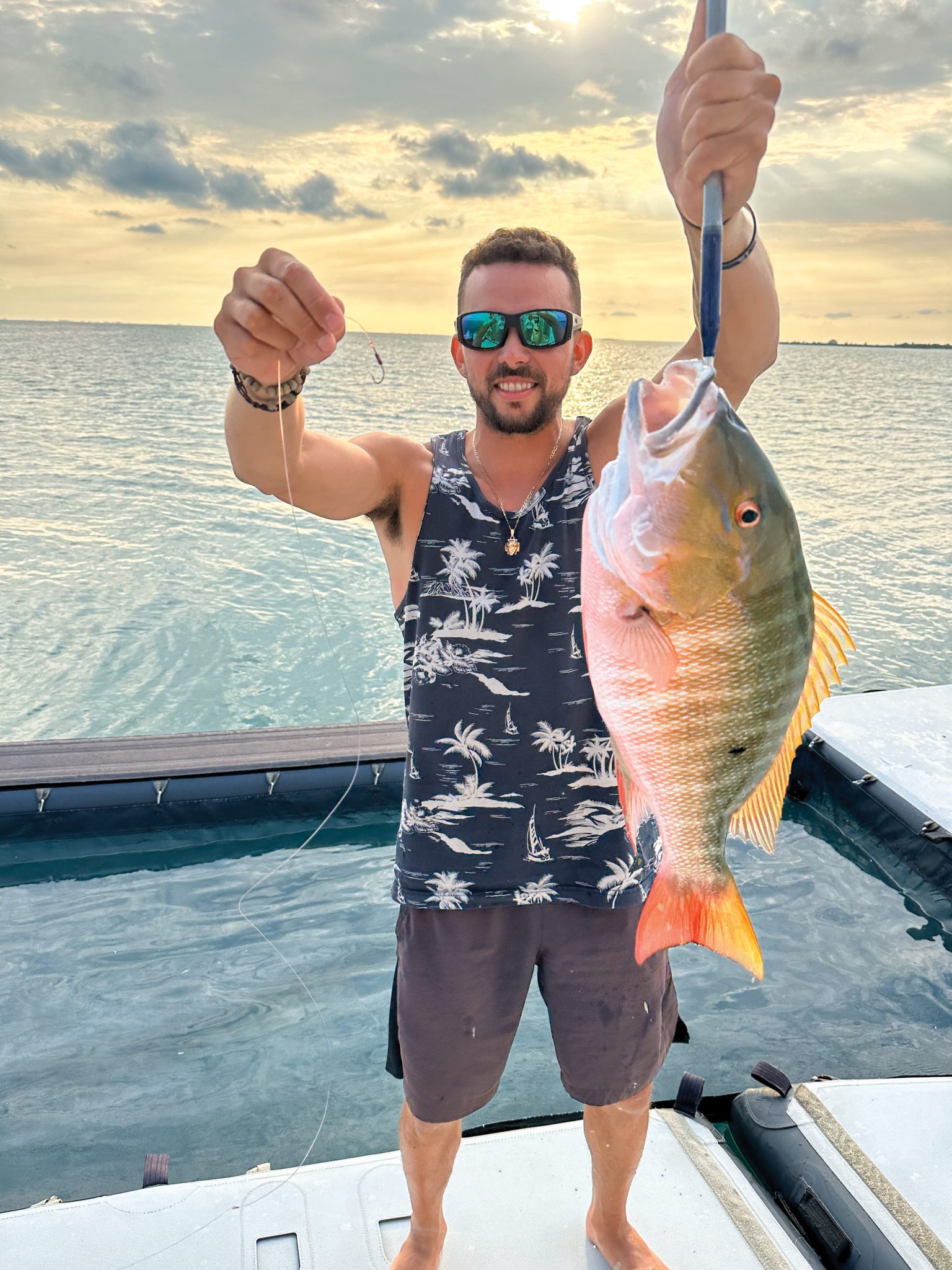 Steve Couch spent time catching mutton snapper off the swim platform in ...