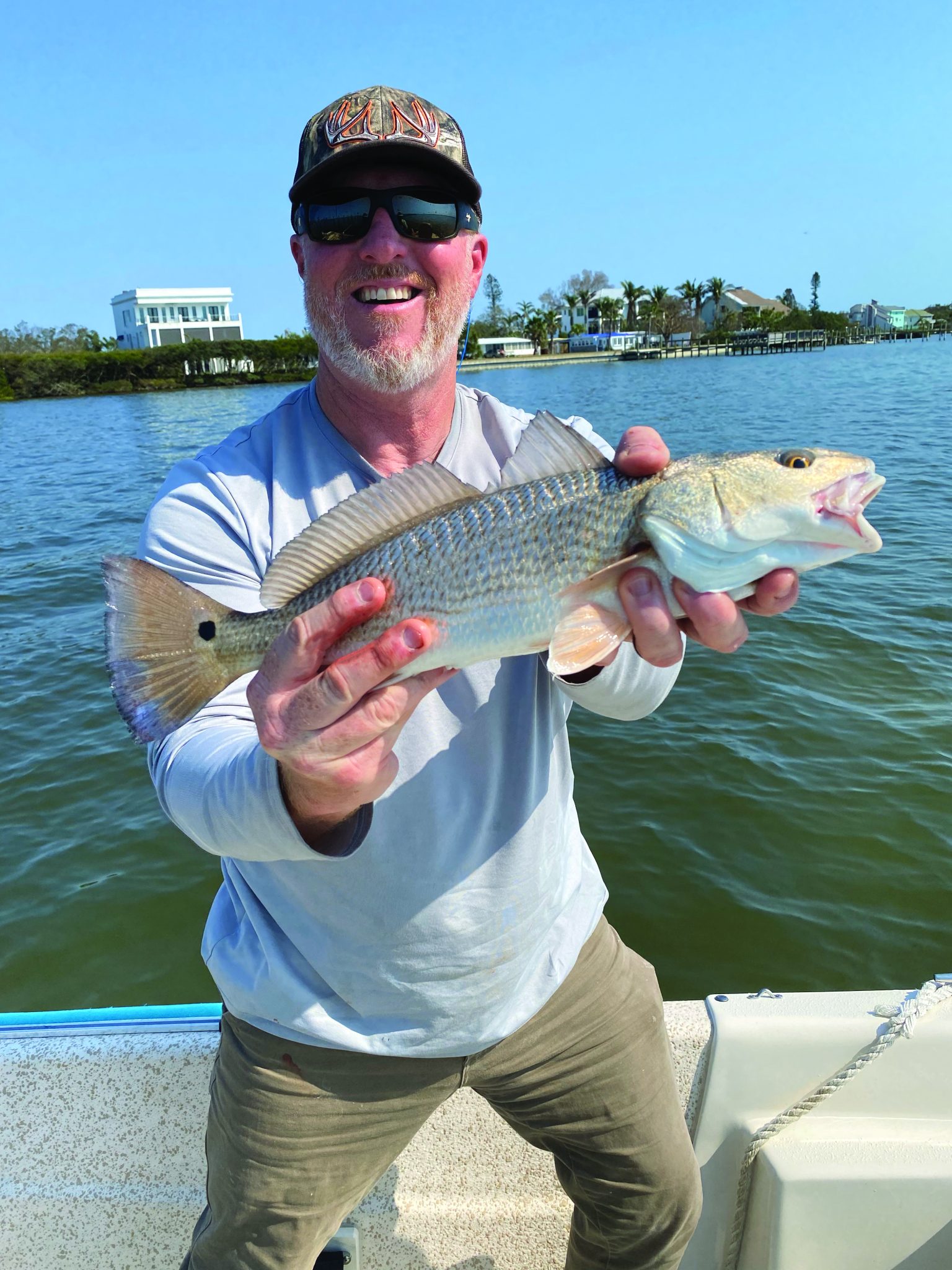 Terry Smith with some redfish action in Anna Maria Island. - Coastal ...